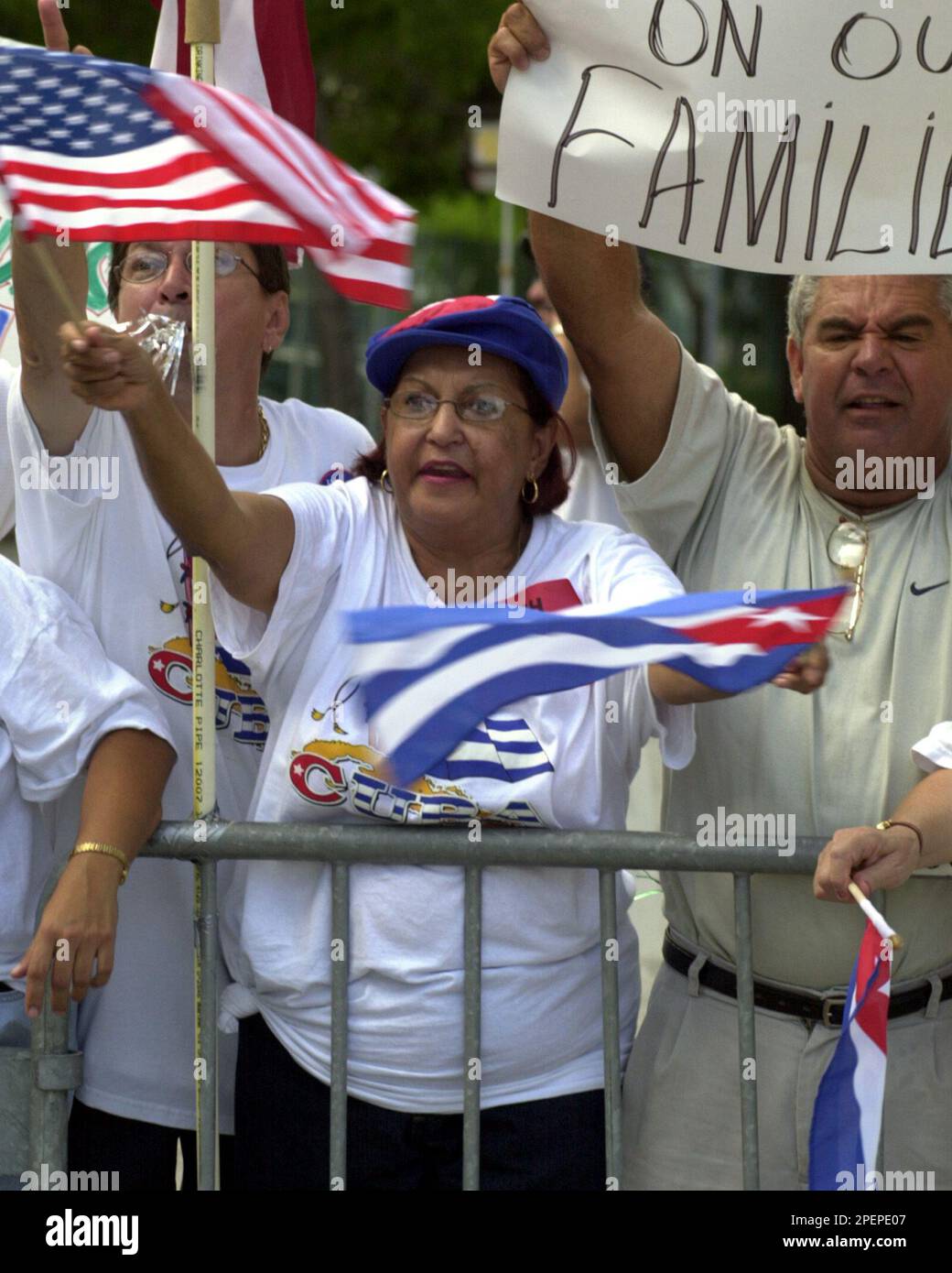Martha Perez, left, and Carlos Espinosa chant anti-Bush slogans at Bush ...