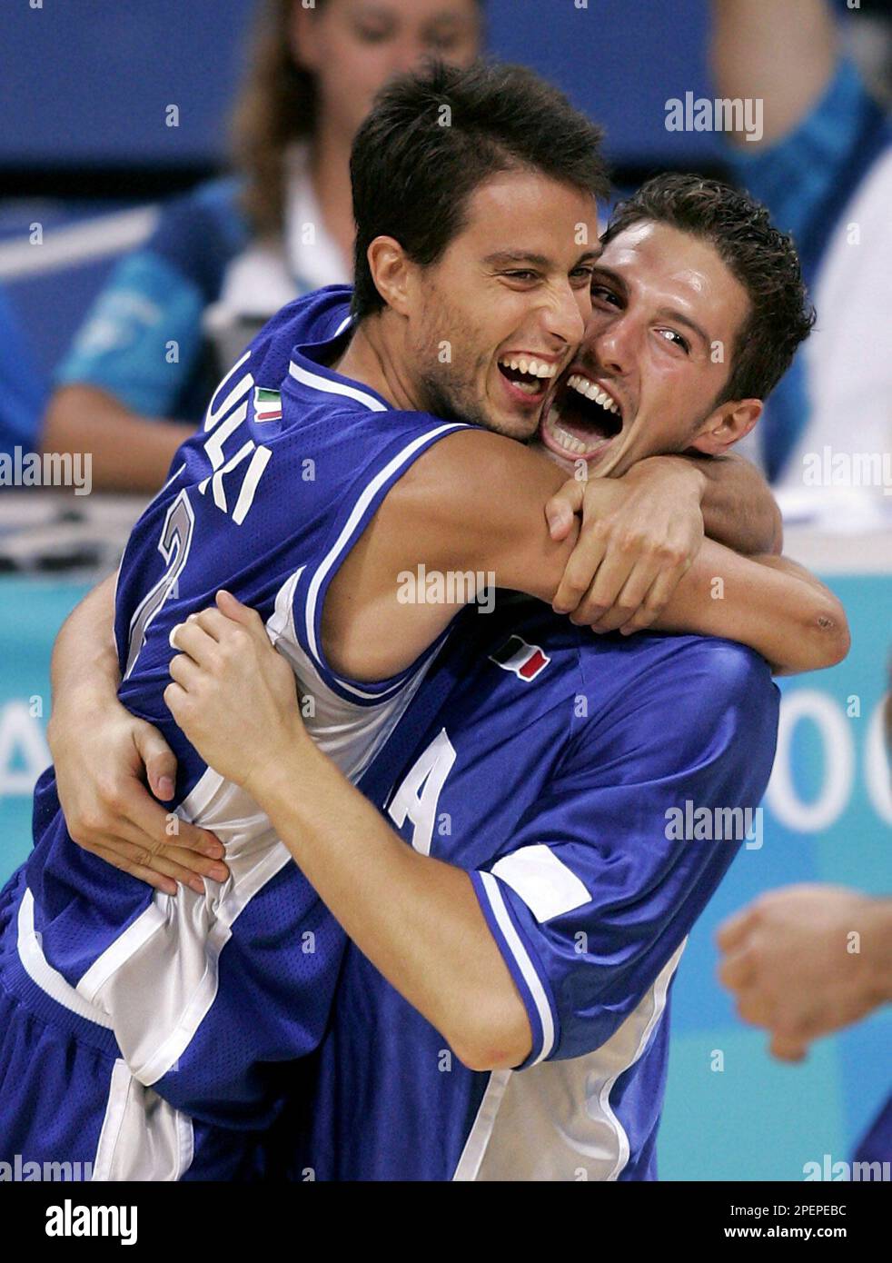Italy's Massimo Bulleri, left, and Alex Righetti celebrate their win ...