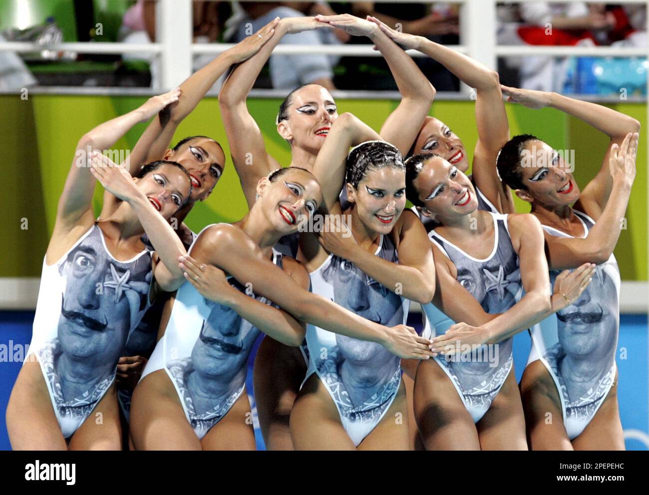 Spain's team, wearing swimsuits bearing the picture of famous Spanish ...