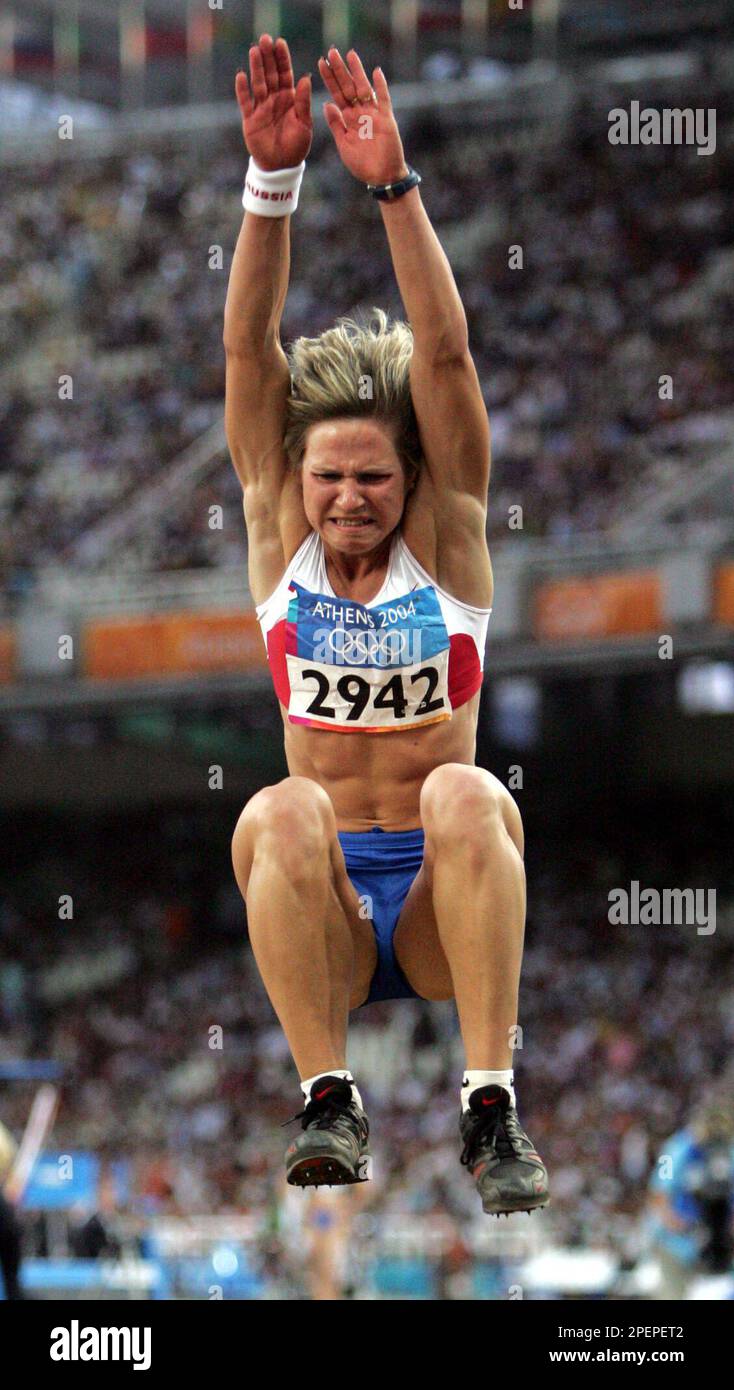 Irina Simagina of Russia competes in the long jump final for a silver ...