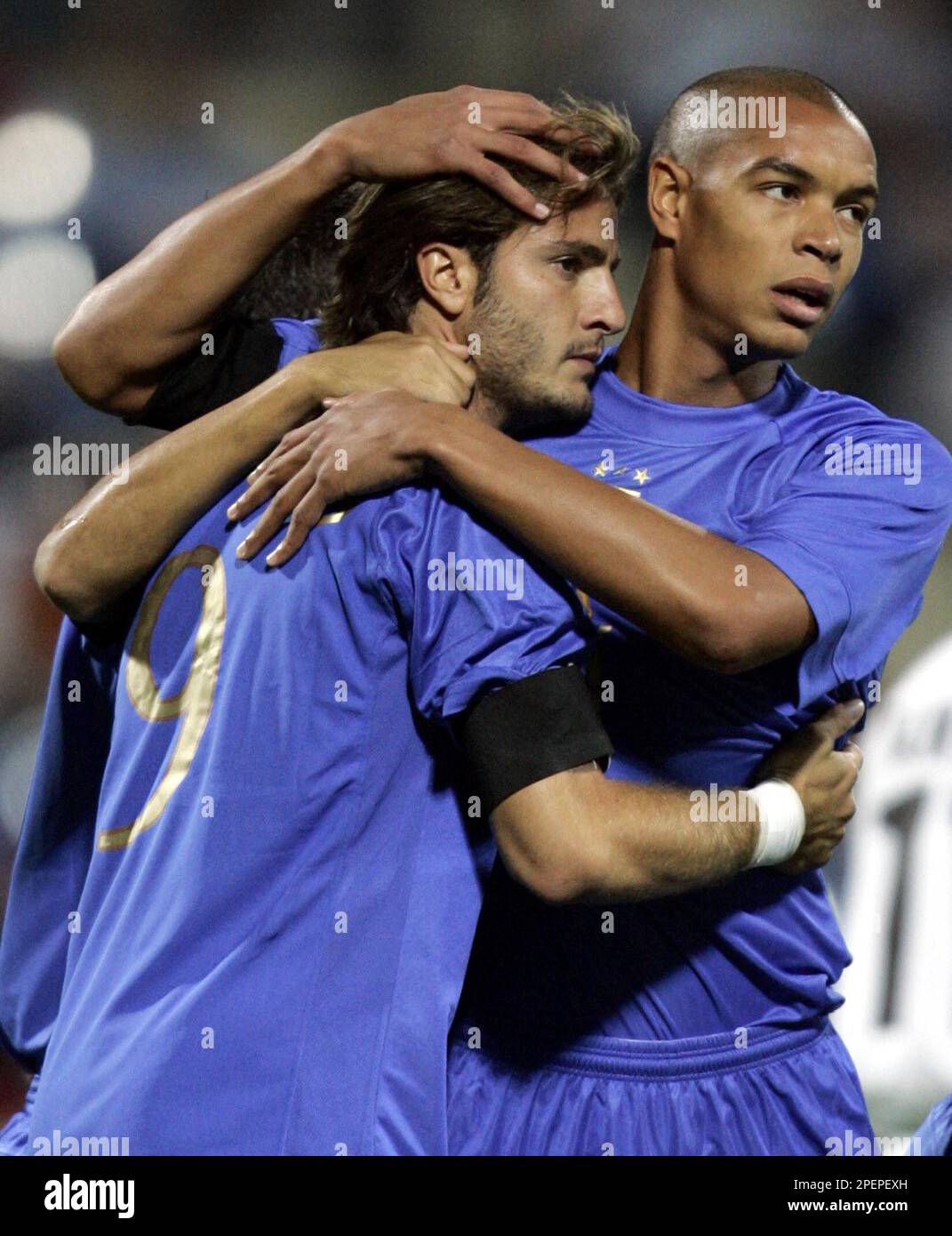 Italy's Alberto Gilardino celebrates withhis teammate Matteo Ferrari ...