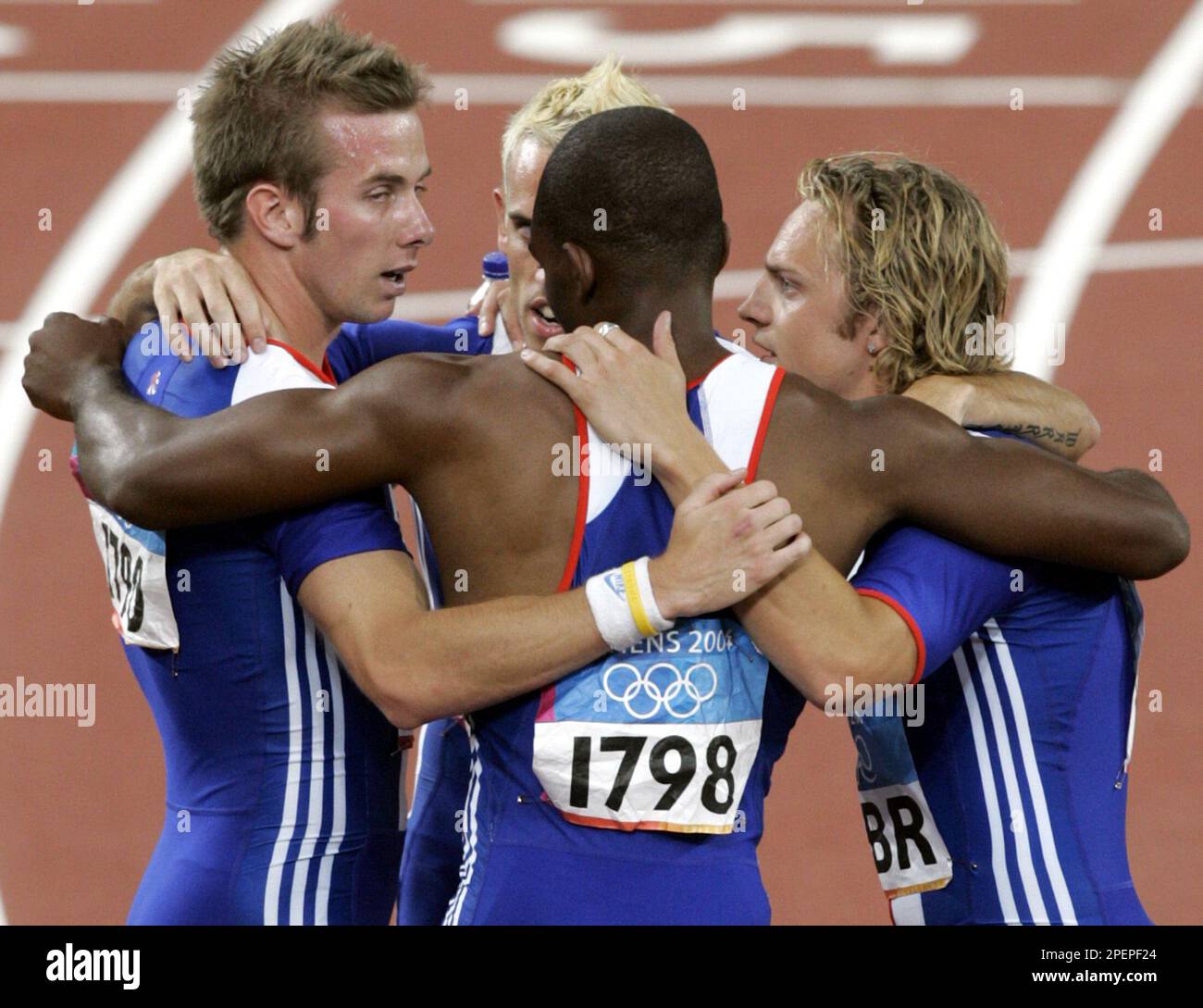 Great Britain's 4 x 400 meter relay team Tim Benjamin, left, Malachi ...