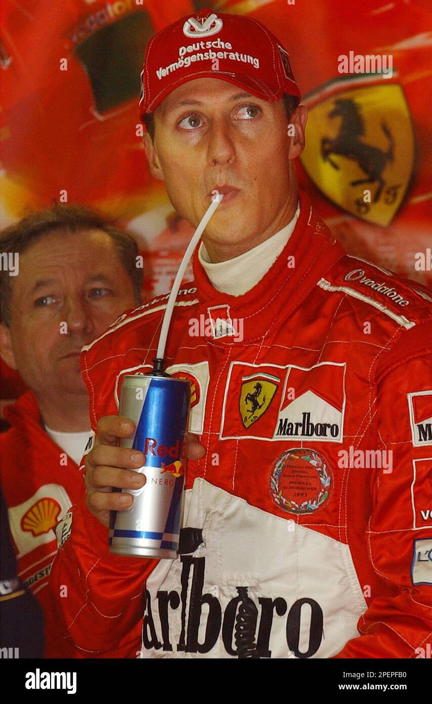 Ferrari driver Michael Schumacher drinks after a free practice of the ...