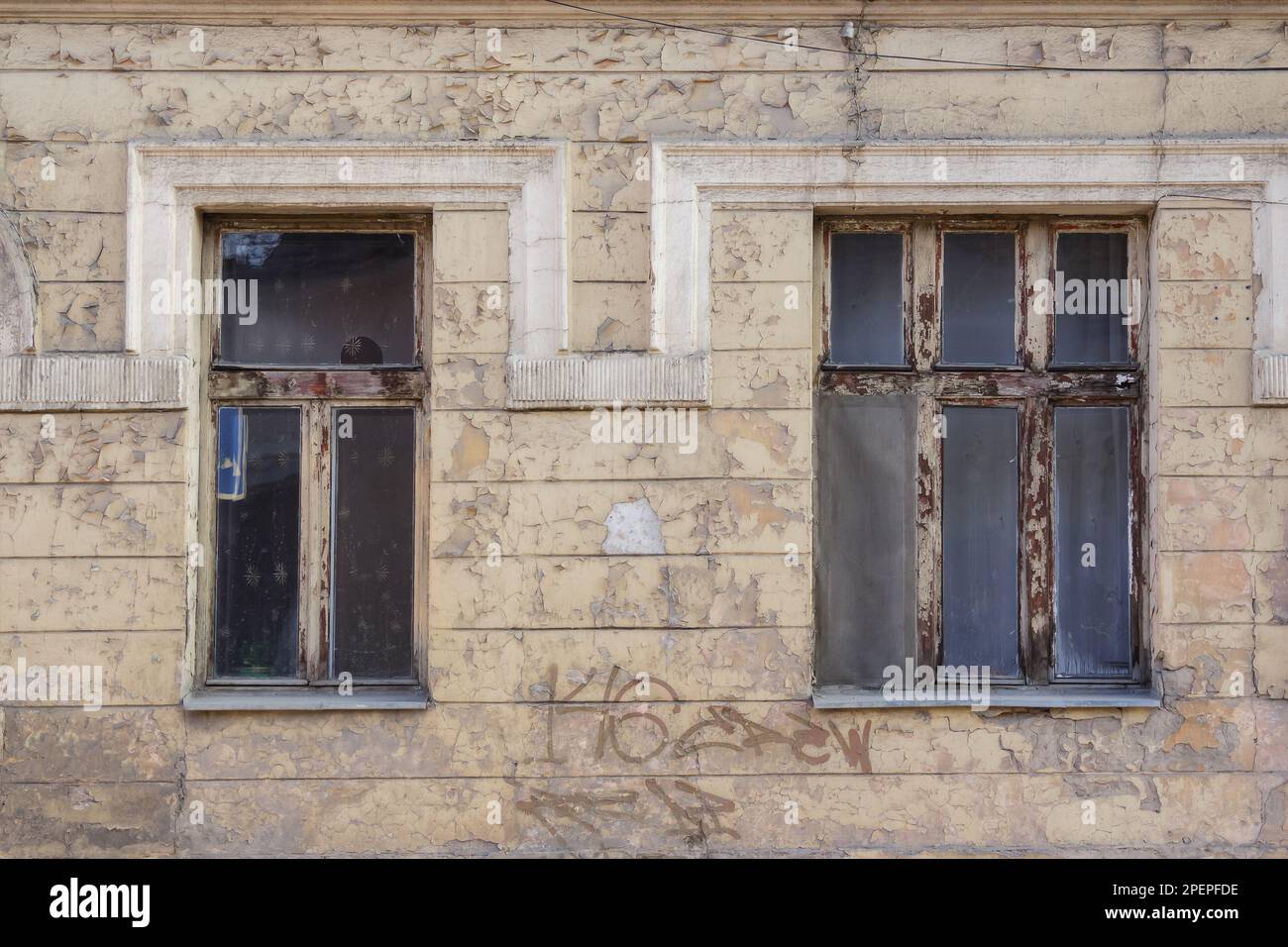 retro windows on the grunge facade. traditional old european ...