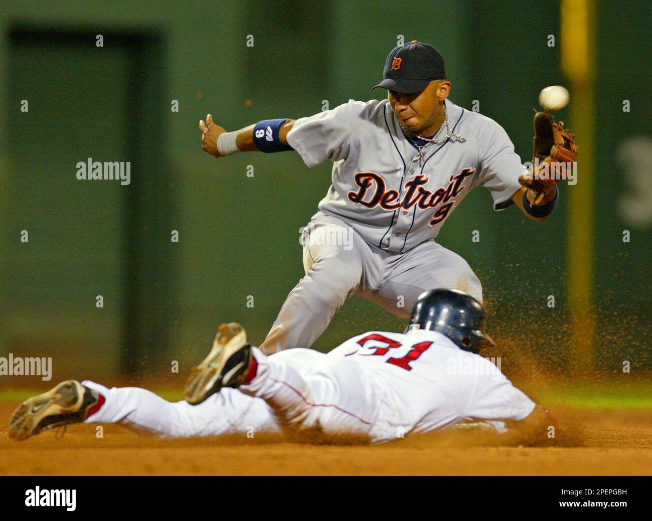 Detroit Tigers' Carlos Guillen can't handle the throw from catcher Ivan ...