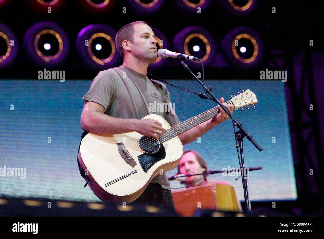 Jack Johnson performing at the Live Earth concert. Aussie Stadium ...