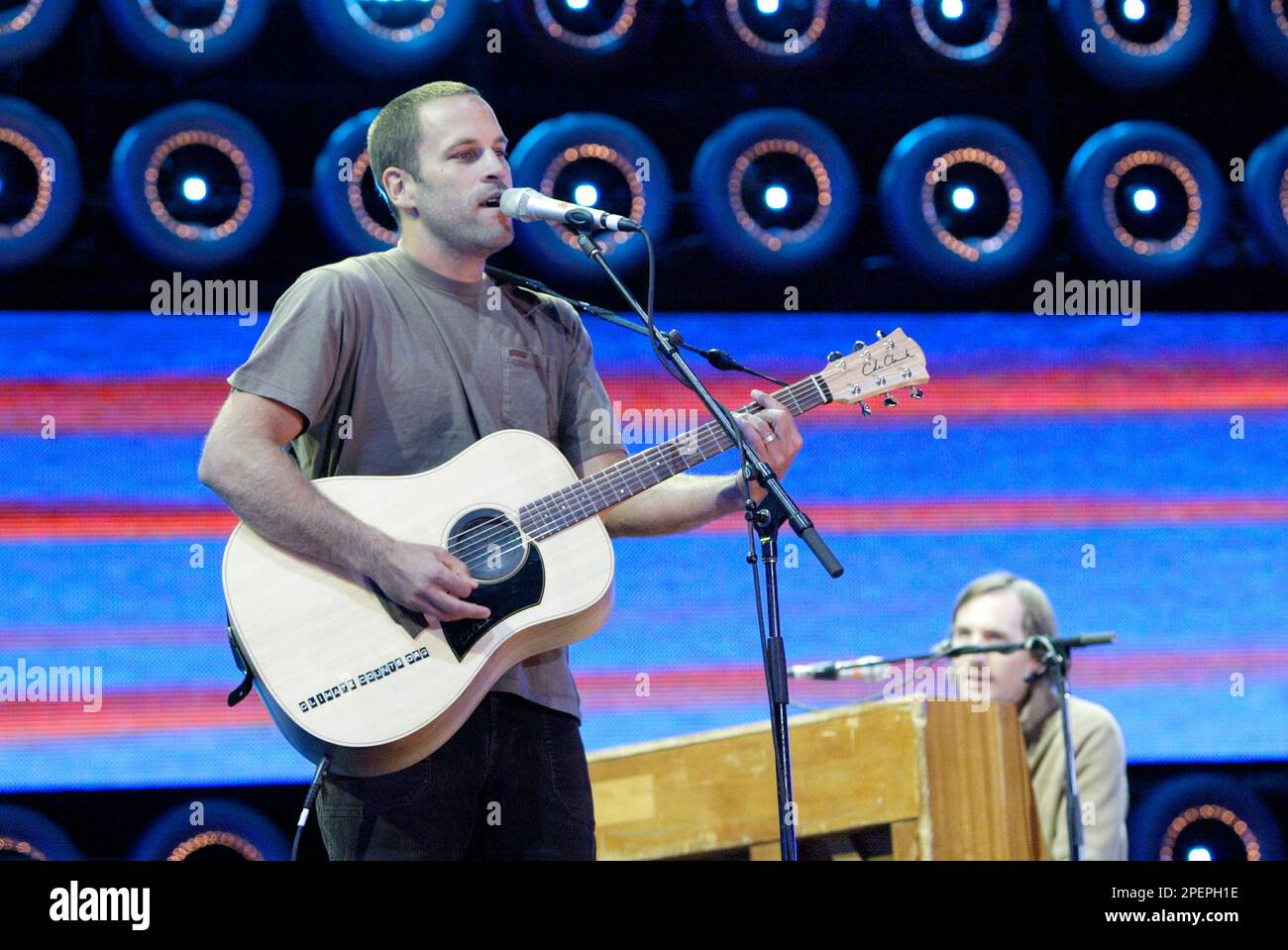 Jack Johnson performing at the Live Earth concert. Aussie Stadium ...
