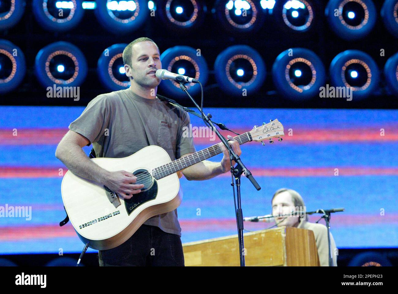 Jack Johnson performing at the Live Earth concert. Aussie Stadium ...