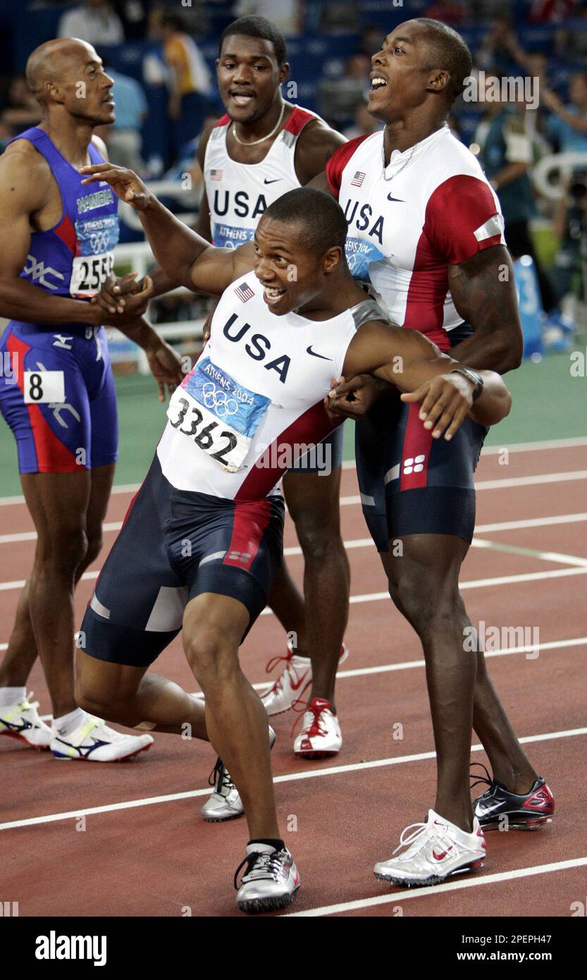 United States' Bernard Williams (3362) reacts as he is lifted up by ...