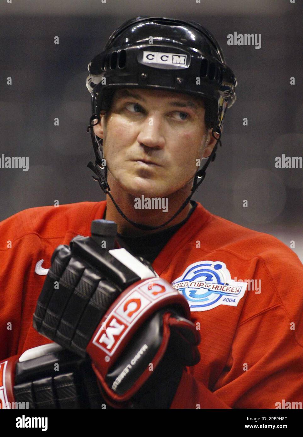 Team Canada's Mario Lemieux looks on during a practice session for the ...