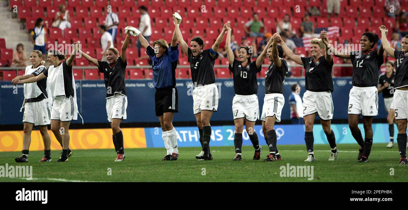 German soccer players celebrate their victory over Sweden at the end of ...
