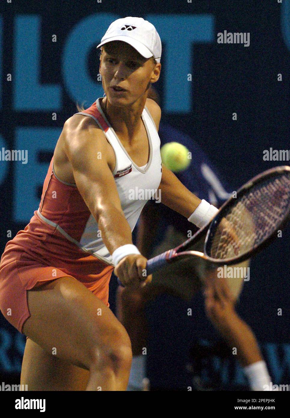 Elena Dementieva of Russia hits a backhand return to Claudine Schaul of ...