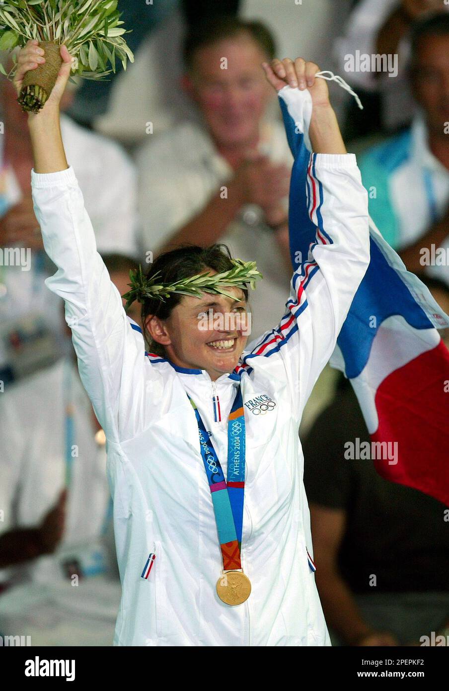 Gold medalist Faustine Merret from France celebrates during the winning ...