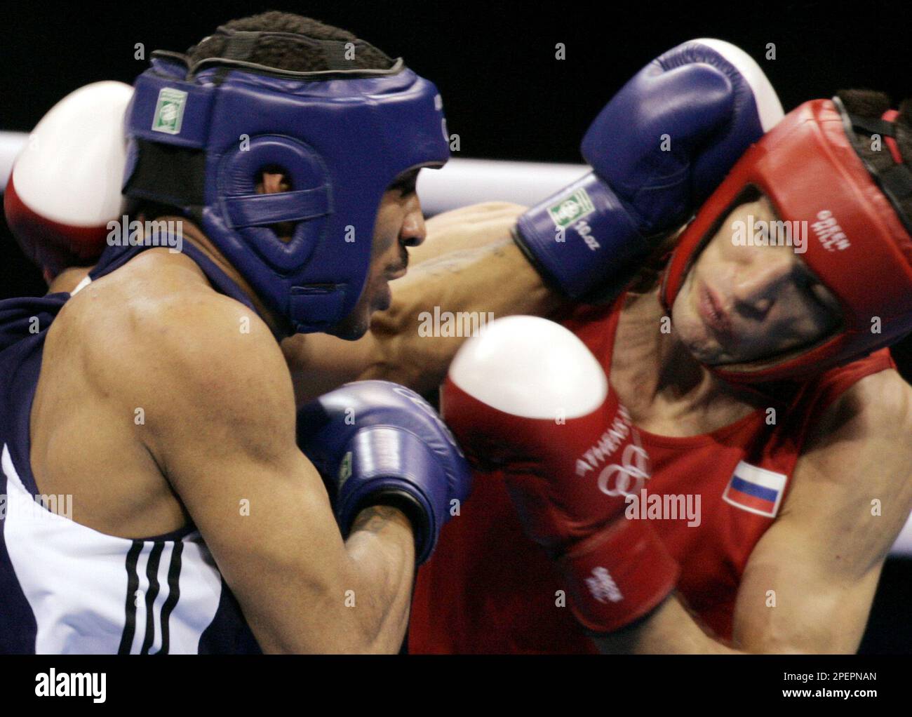 USA's Andre Ward, left, from Oakland, Calif., hits Russia's Evgeny ...