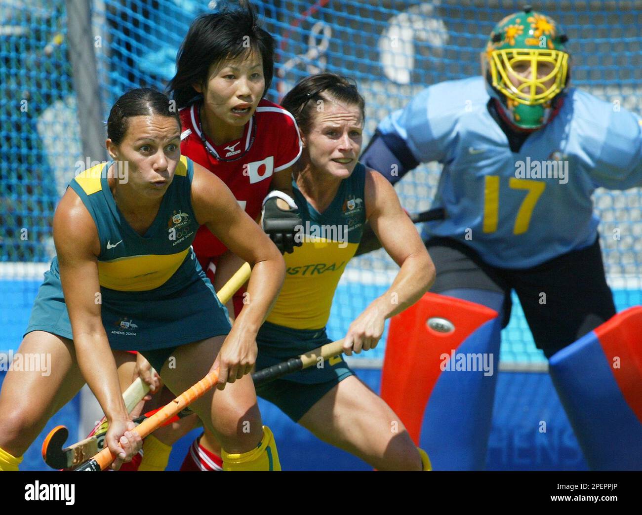 Japan's Komori Tomomi, 2nd from left, and Australia's Bianca Netzler ...