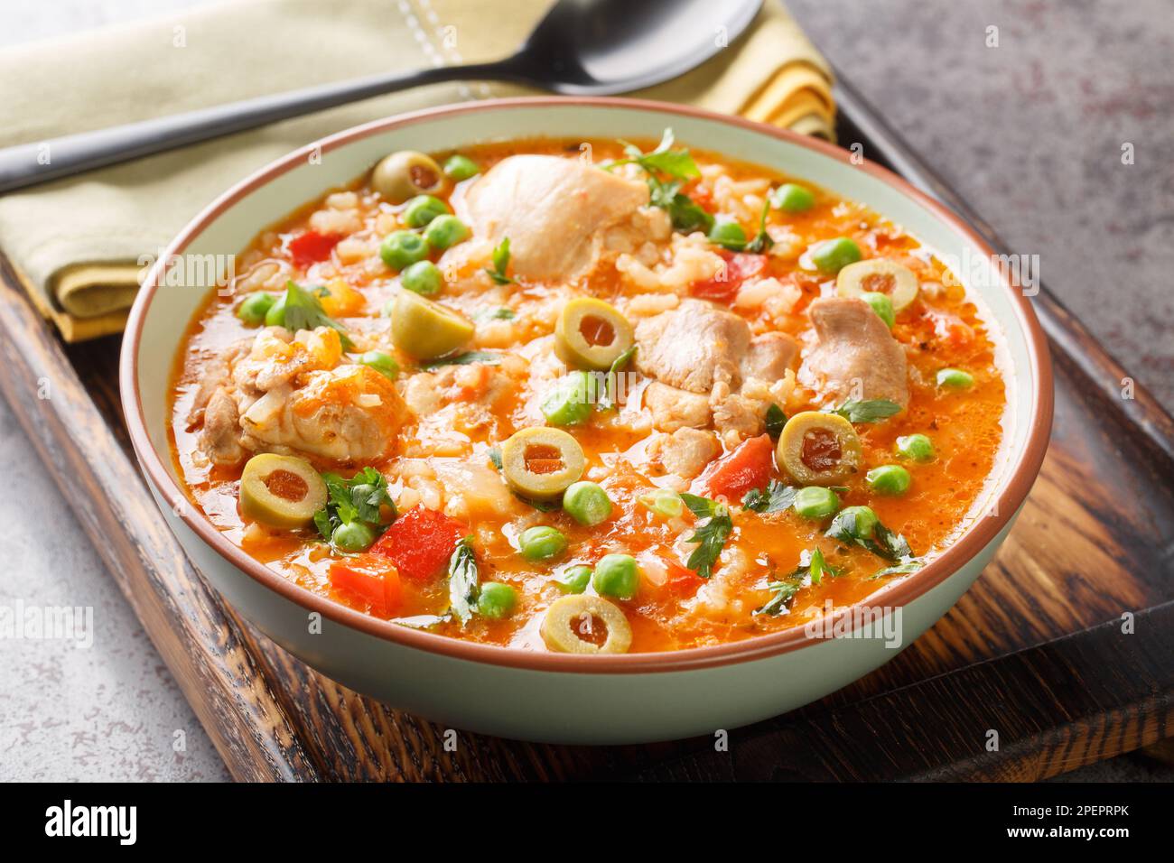 Puerto Rican dish asopao de pollo, a cross between soup and paella, is ...