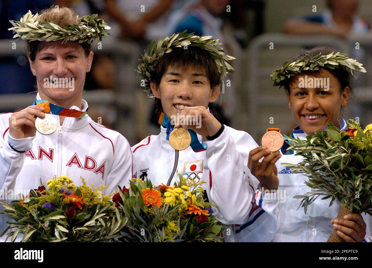 Winners of the women's freestyle 55kg wrestling event during the medal ...