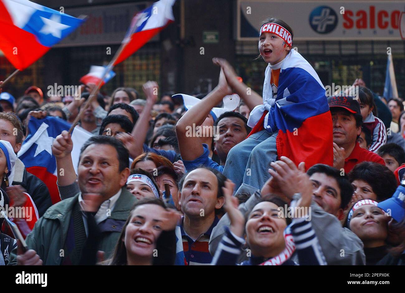 Chilean fans follow the tennis match on a giant screen in Athens of ...