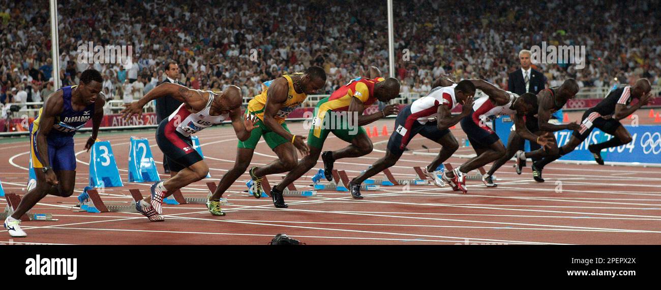 At the start of the 100m are, from left to right: Obadele Thompson, of ...