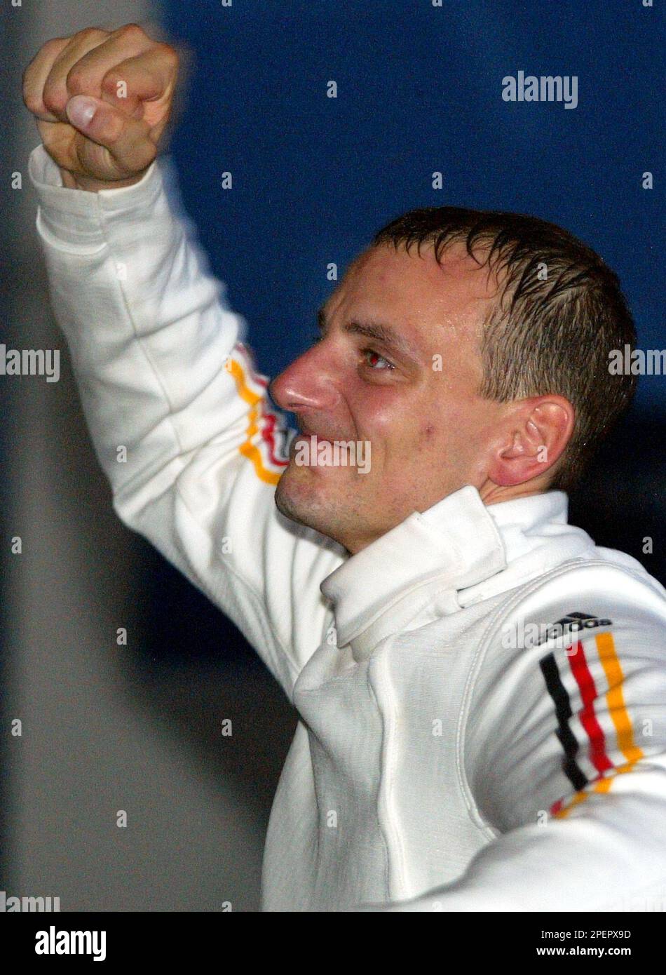 Germany's fencer Daniel Strigel, celebratse after winning the bronze ...