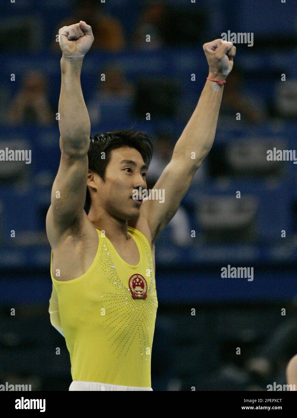 China's Teng Haibin celebrates at the finish of his pommel horse ...