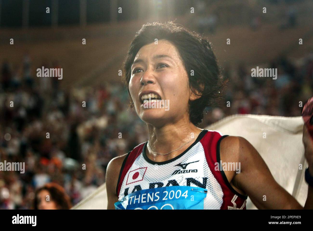 Japan's Mizuki Noguchi reacts after she finished first in the women's ...