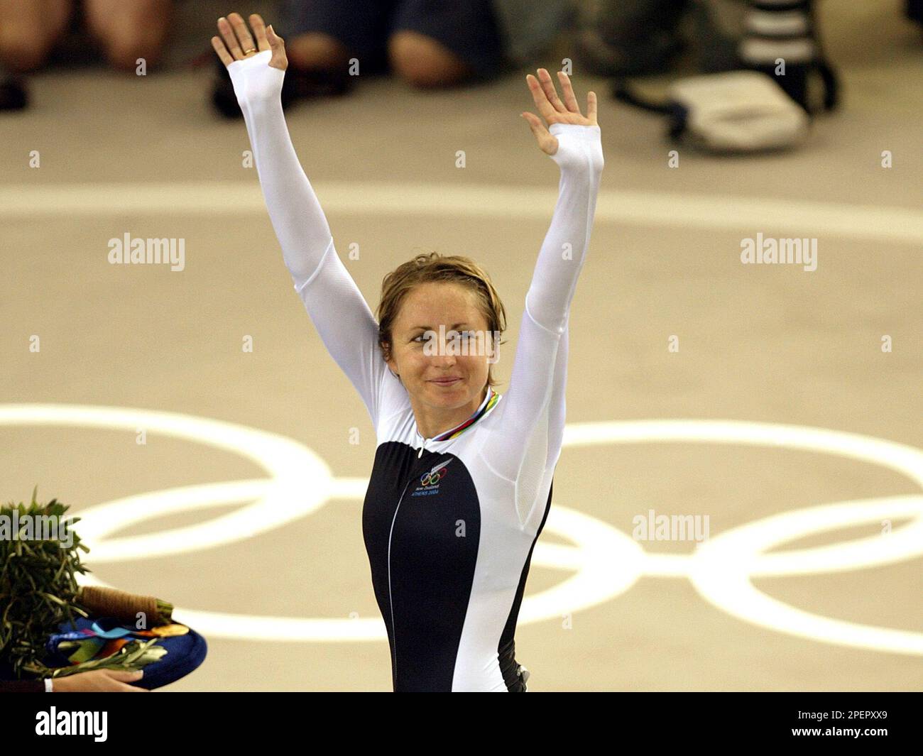 New Zealand's Sarah Ulmer, gold, on podium after winning the women's ...