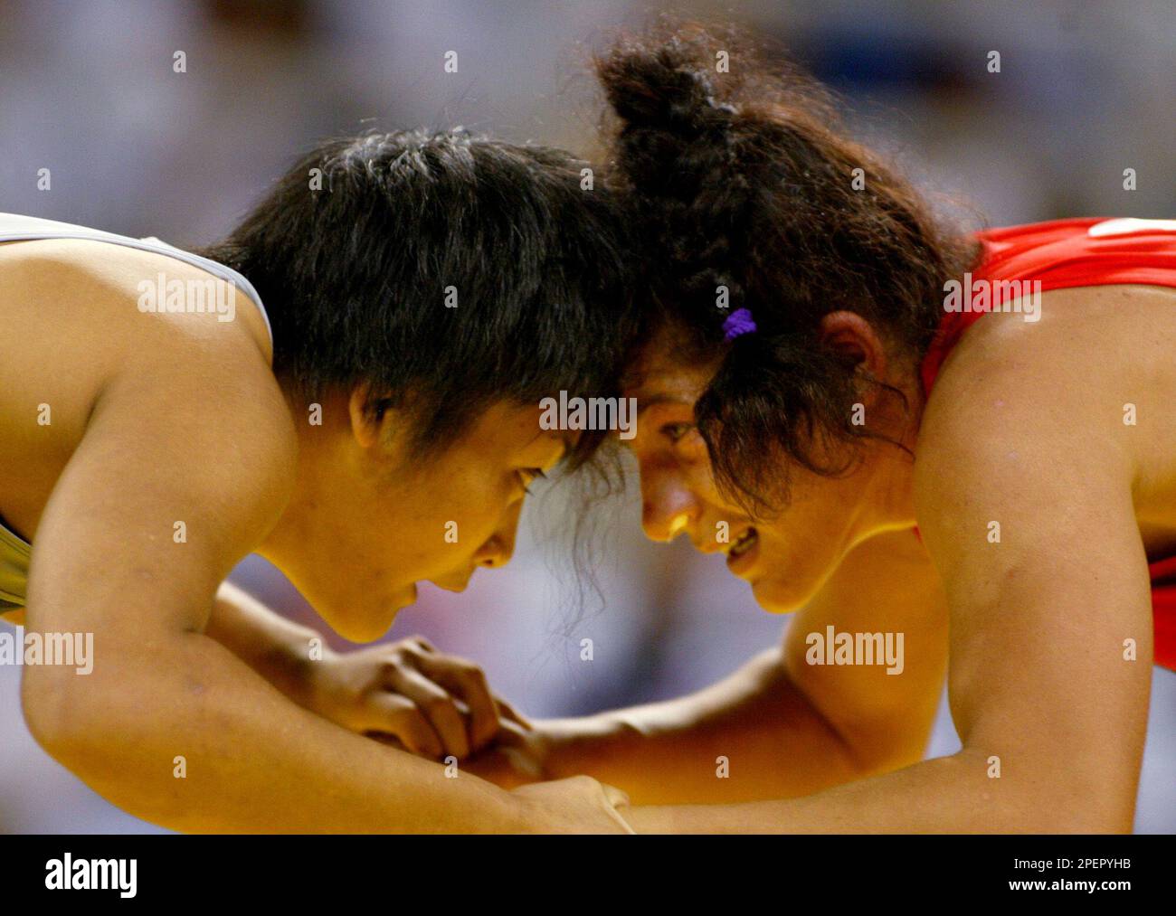 Kaori Icho, from Japan, left, and Lyudmyla Golovchenko, from Ukraine ...