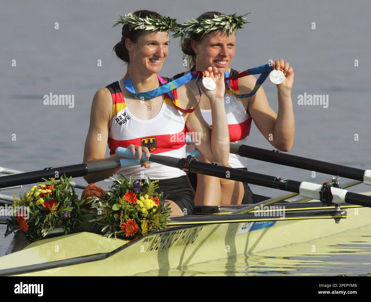 Germany's Daniela Reimer, right, and Claudia Blasberg display the ...