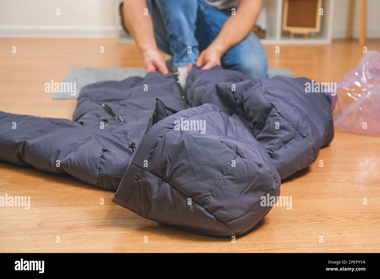 Plastic storage with winter clothes hi-res stock photography and images ...