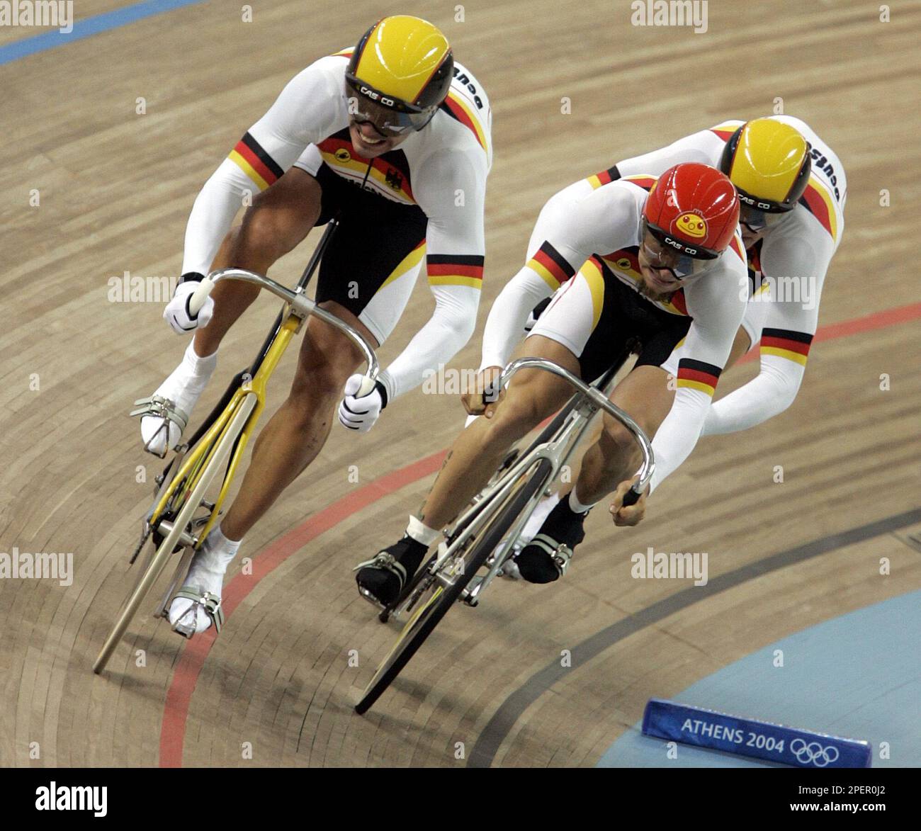The German team, Jens Fiedler, Stefan Nimke and Rene Wolff pedal on ...
