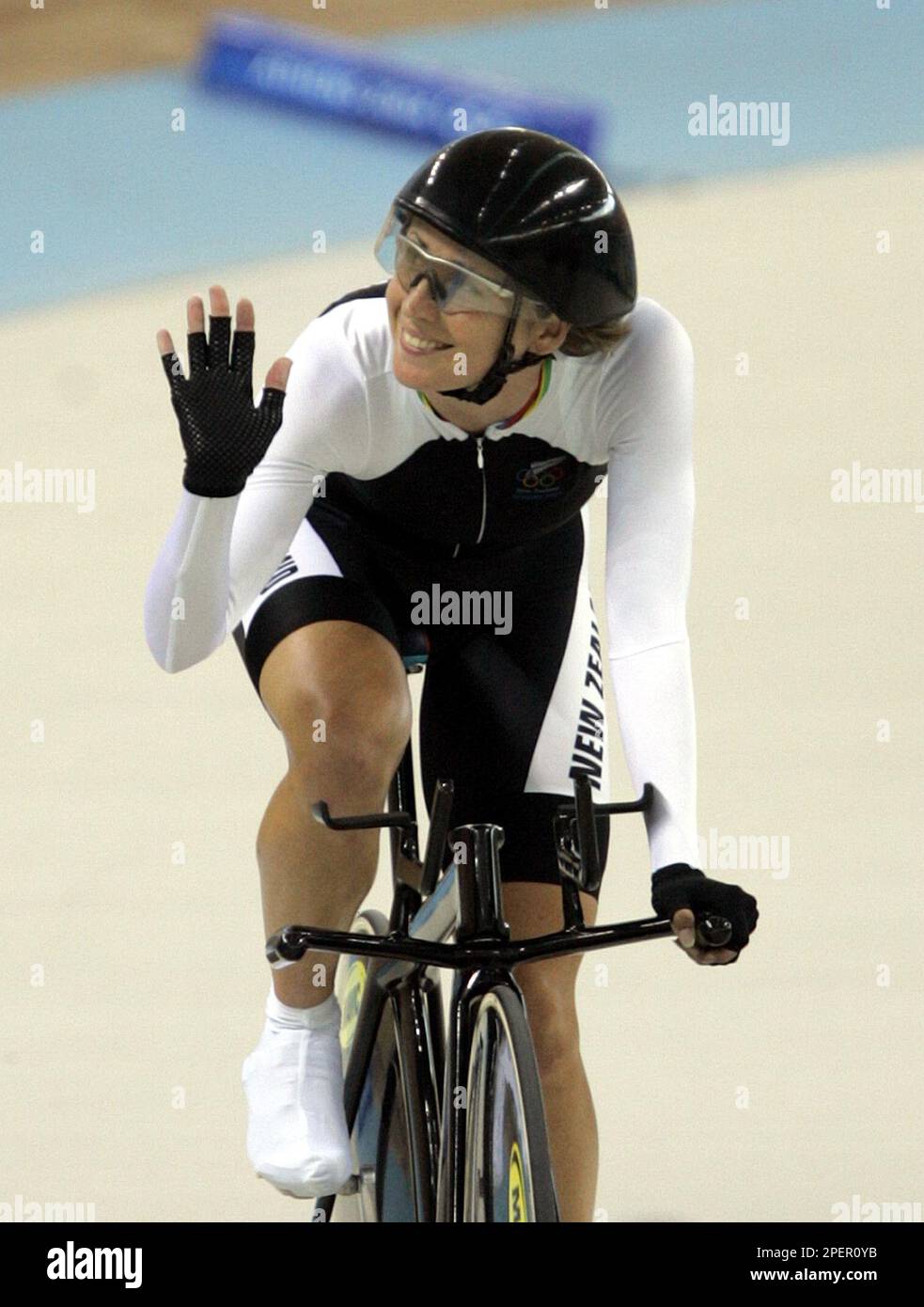 New Zealand's sarah Ulmer salutes after setting a new Olympic and World ...