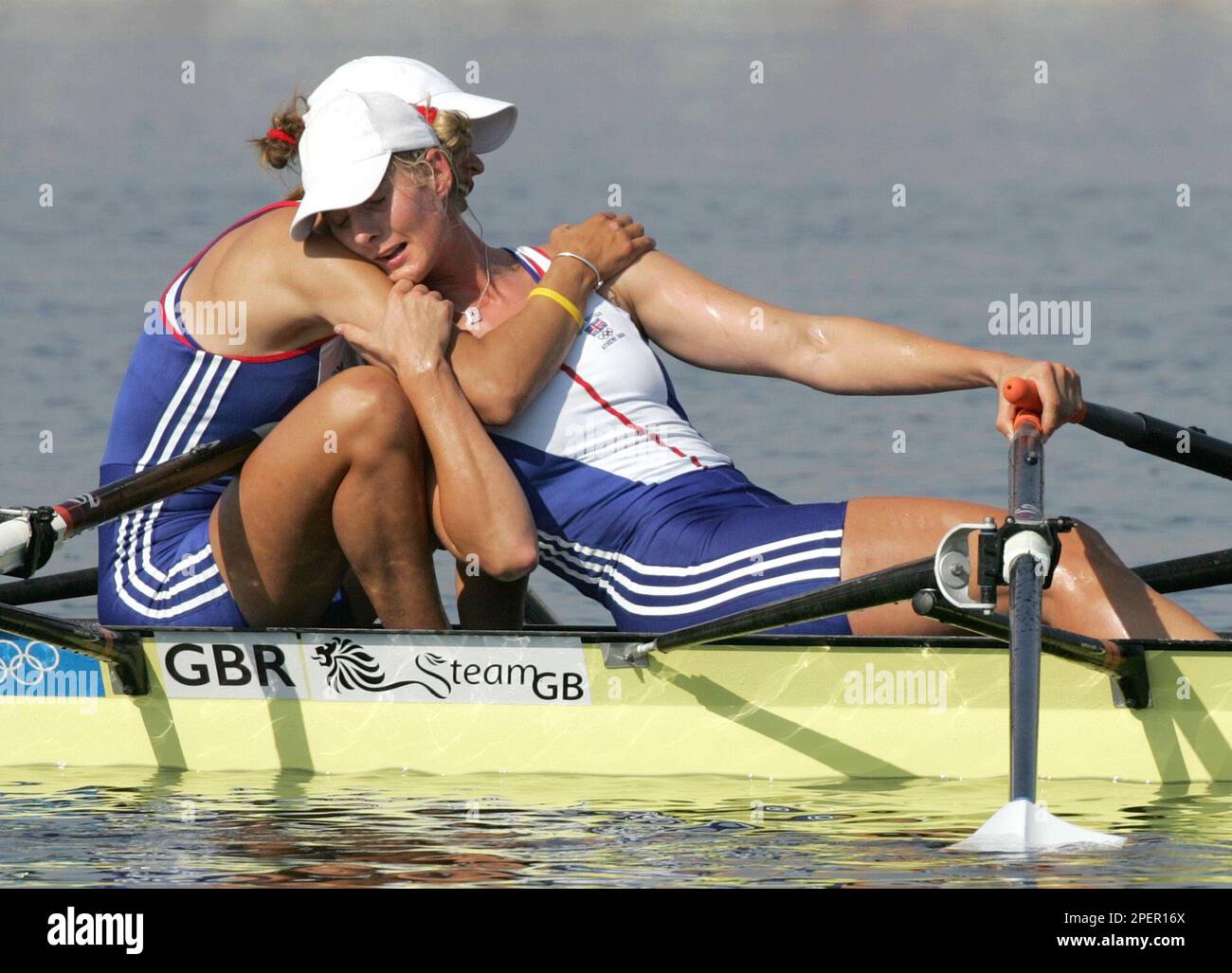 Britain's Sarah Winckless, left, and Elise Laverick react after they ...
