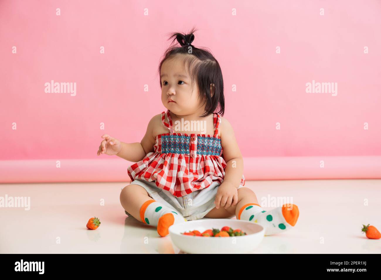 Lovely baby girls play Stock Photo - Alamy