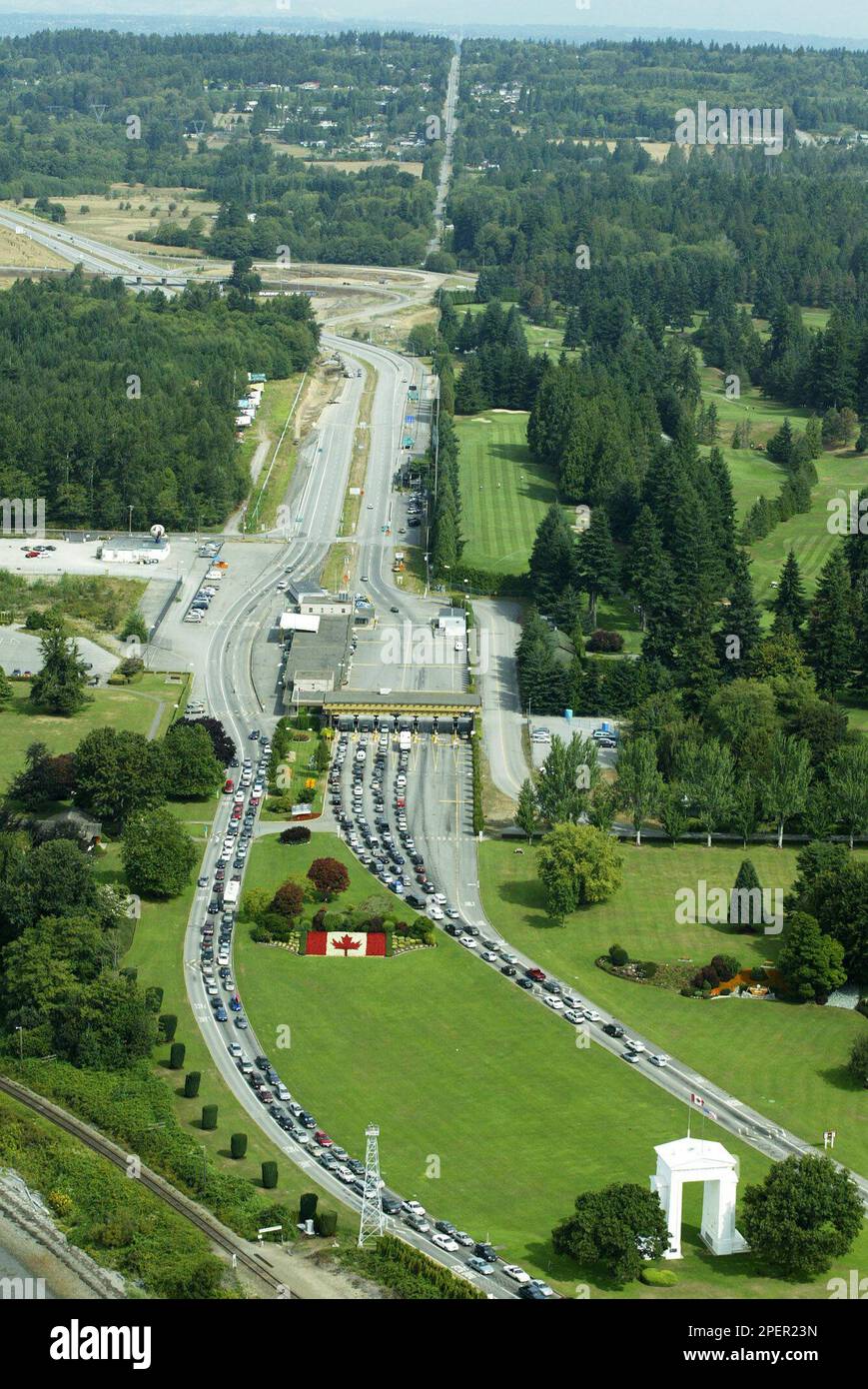 The Peace Arch, lower right, is shown from the air at the U.S. - Canada ...