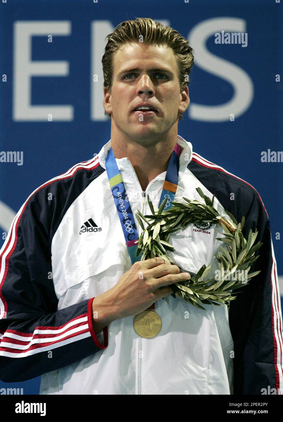 Gary Hall, of the United States, stands on the podium after winning the ...