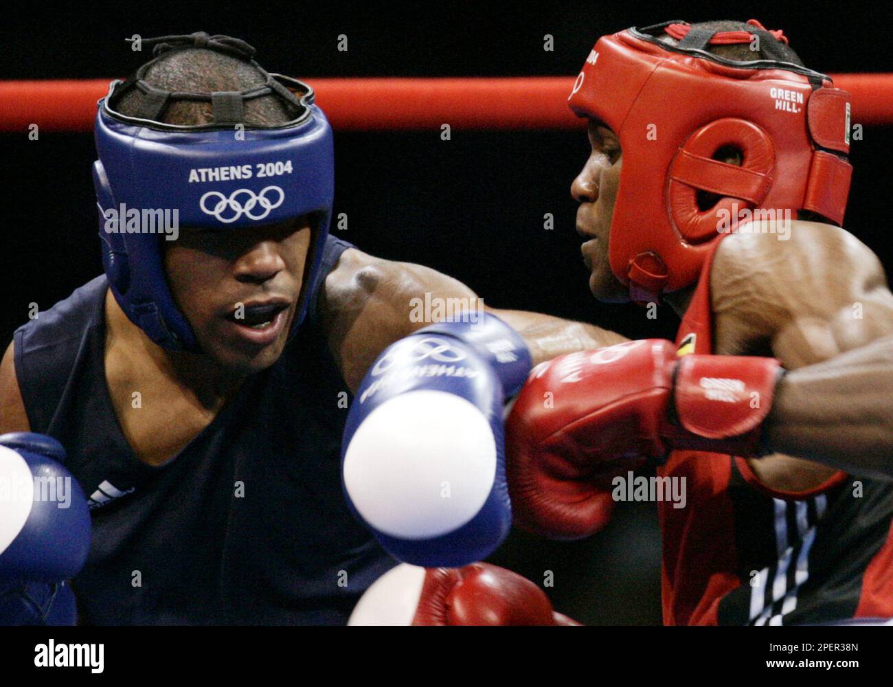 Puerto Rico's Alexander de Jesus, left, and Uganda's Sam Rukundo ...