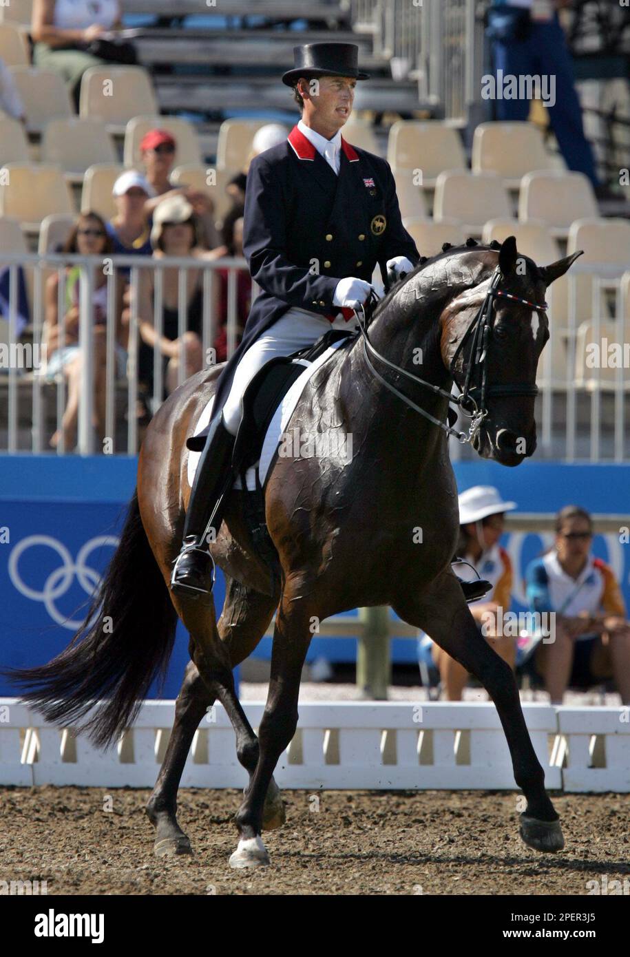 Britain's Carl Hester rides Escapado during the team dressage ...