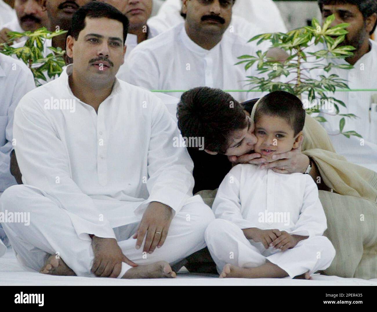 Priyanka Gandhi Vadra kisses her son Rehaan, as husband Robert Vadra ...