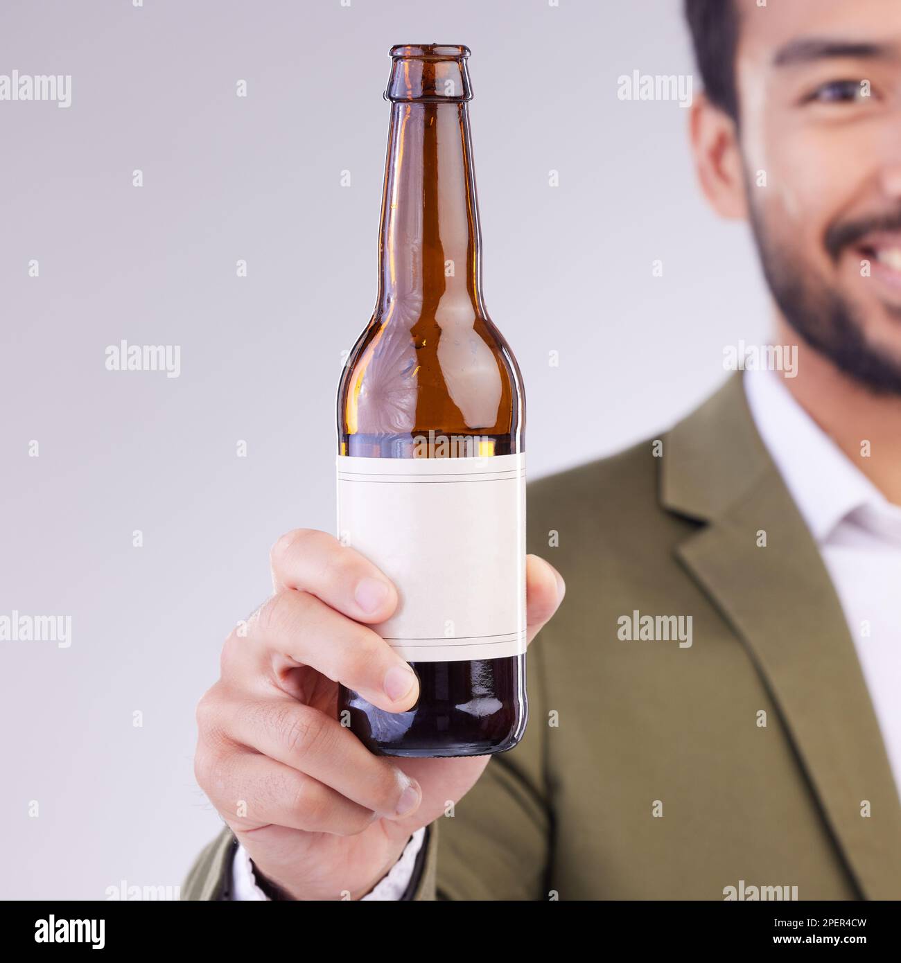 Man face with beer bottle isolated on a white background for alcohol ...