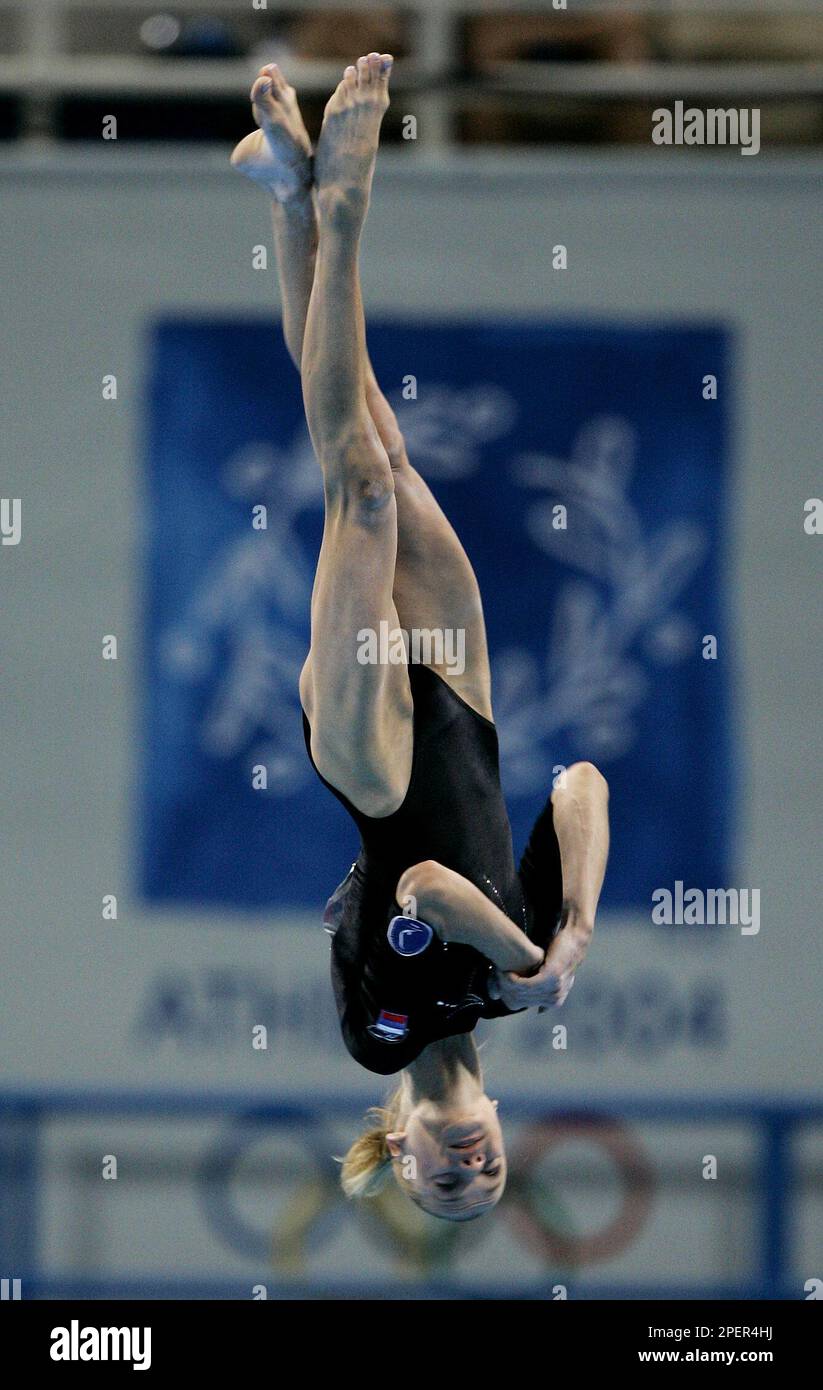 Russias Svetlana Khorkina Flips Through The Air During Her Floor