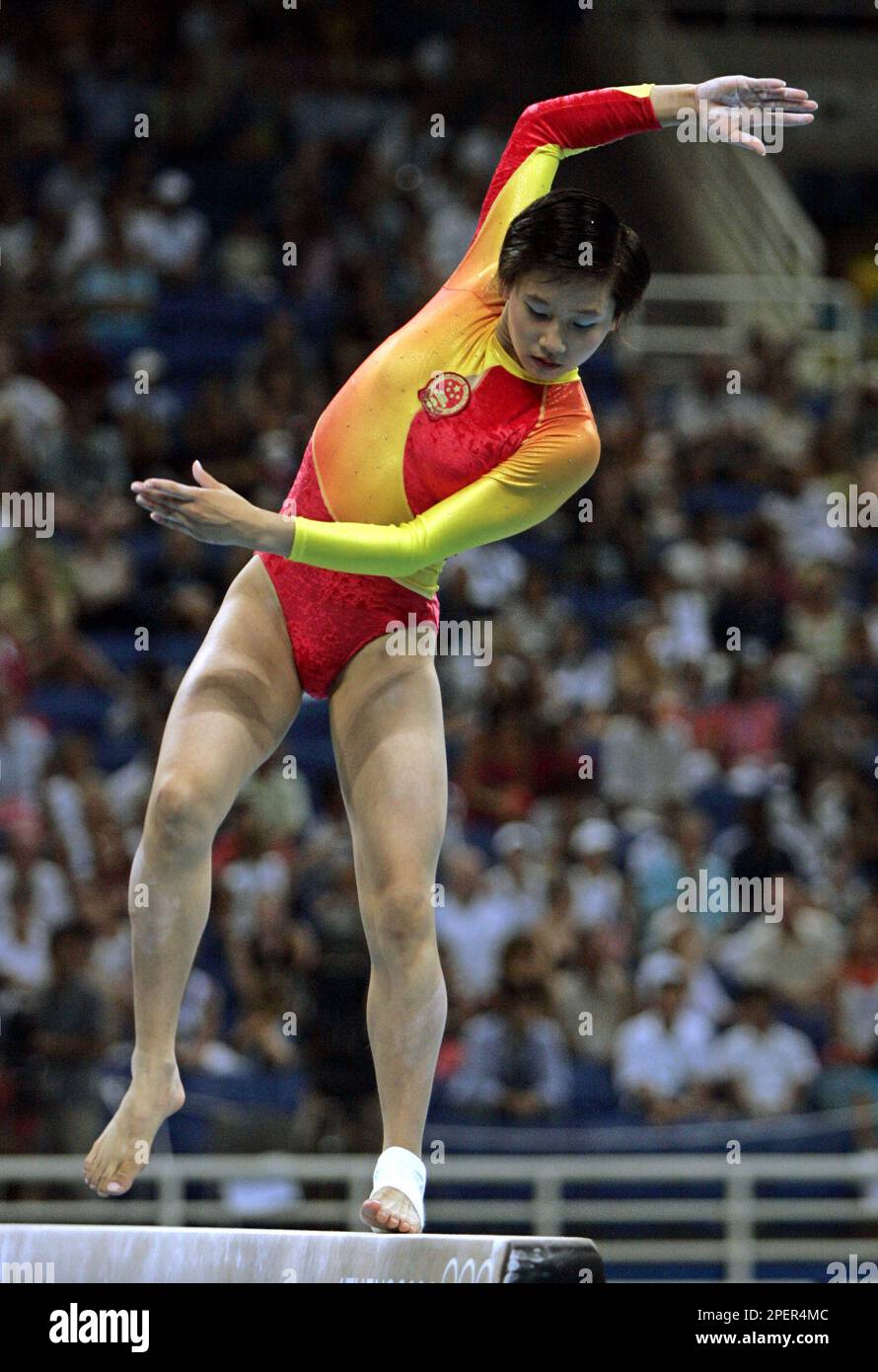Zhang Nan of China bobbles on the balance beam during the women's ...