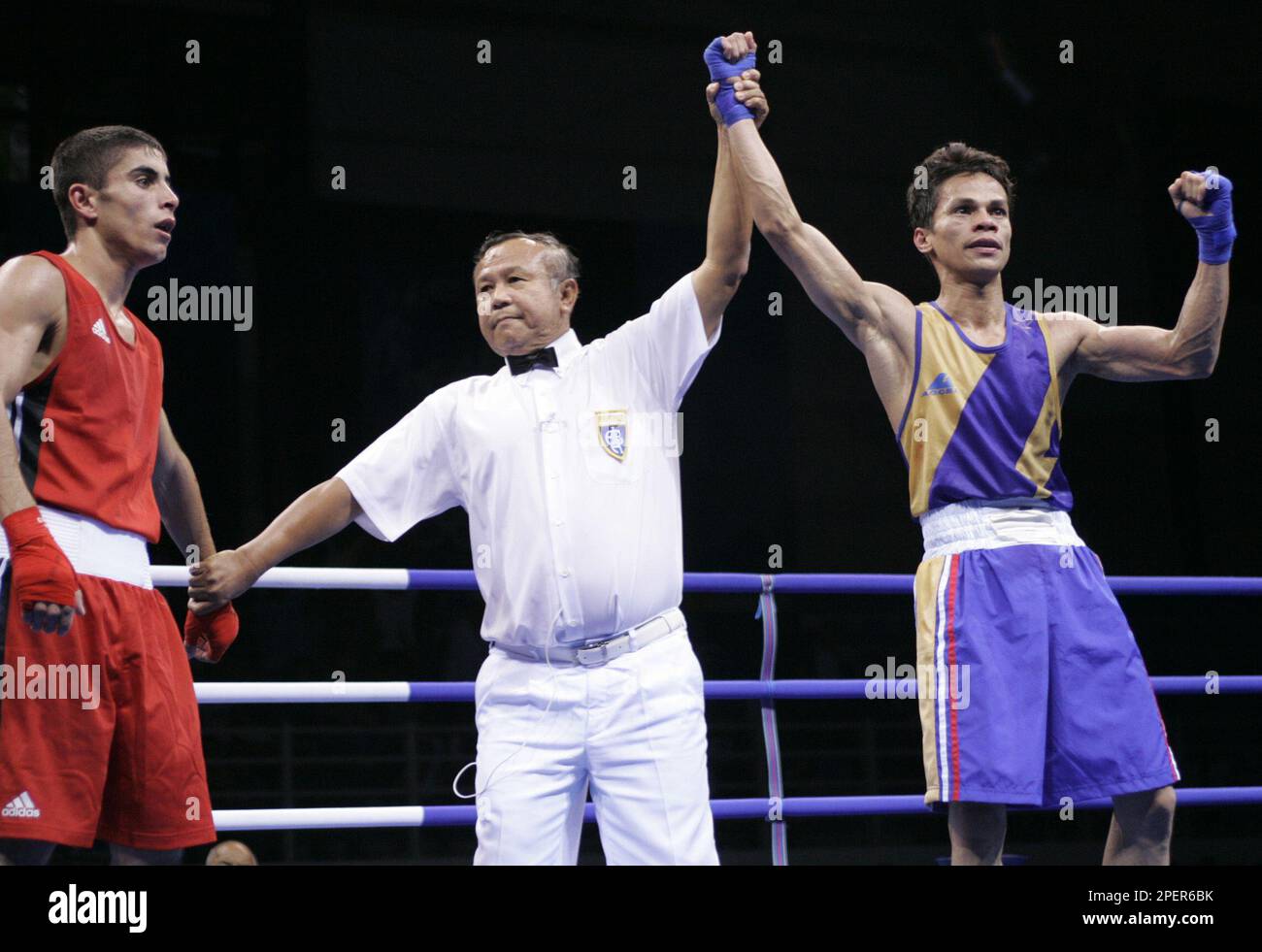 Philippines Harry Tanamor, right, celebrates his victory over ...