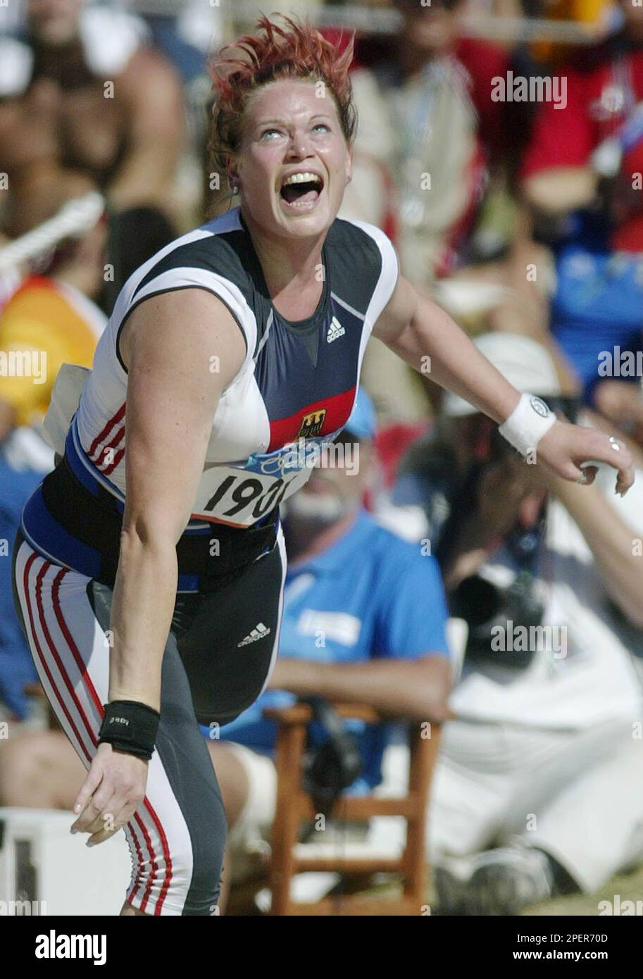 German shot putter Nadine Kleinert wathes her shot put land during the ...