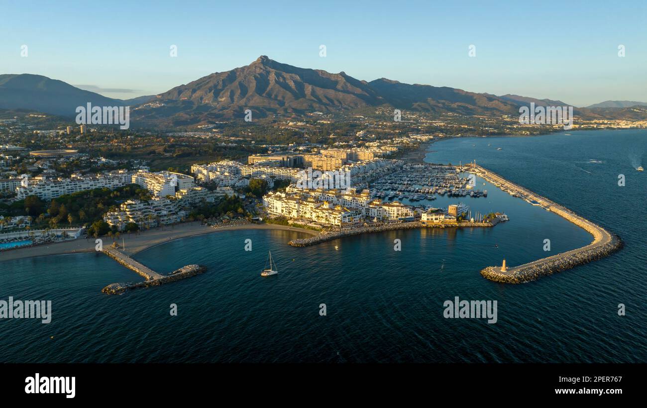 aerial view of port Banus in a beautiful sunset in the city of Marbella ...