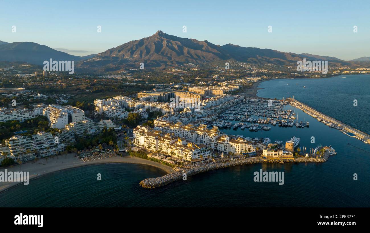 aerial view of port Banus in a beautiful sunset in the city of Marbella ...
