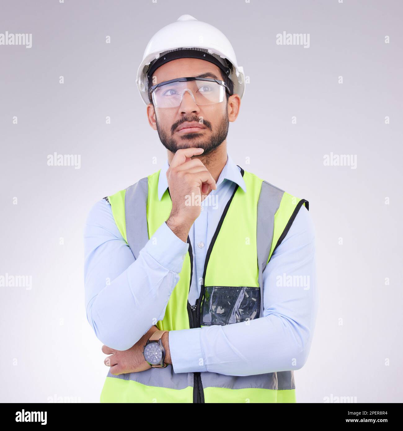Construction worker thinking, serious man with ideas and architect or ...