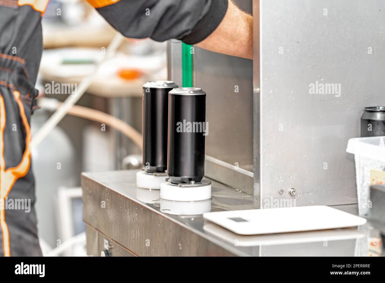 beer filled beverage cans in a brewery Stock Photo - Alamy