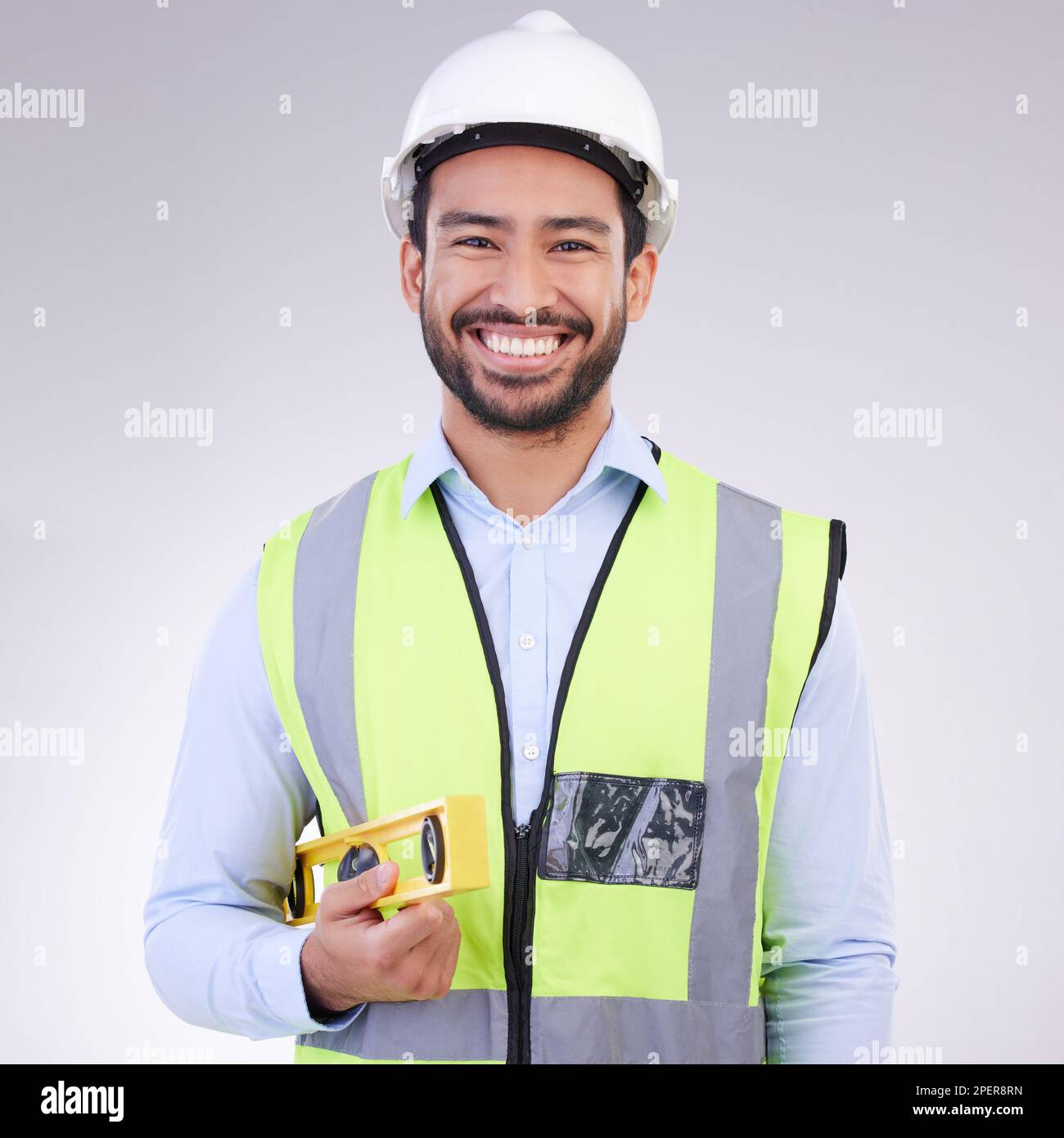 Construction worker in portrait, man with tools and smile, architect or ...