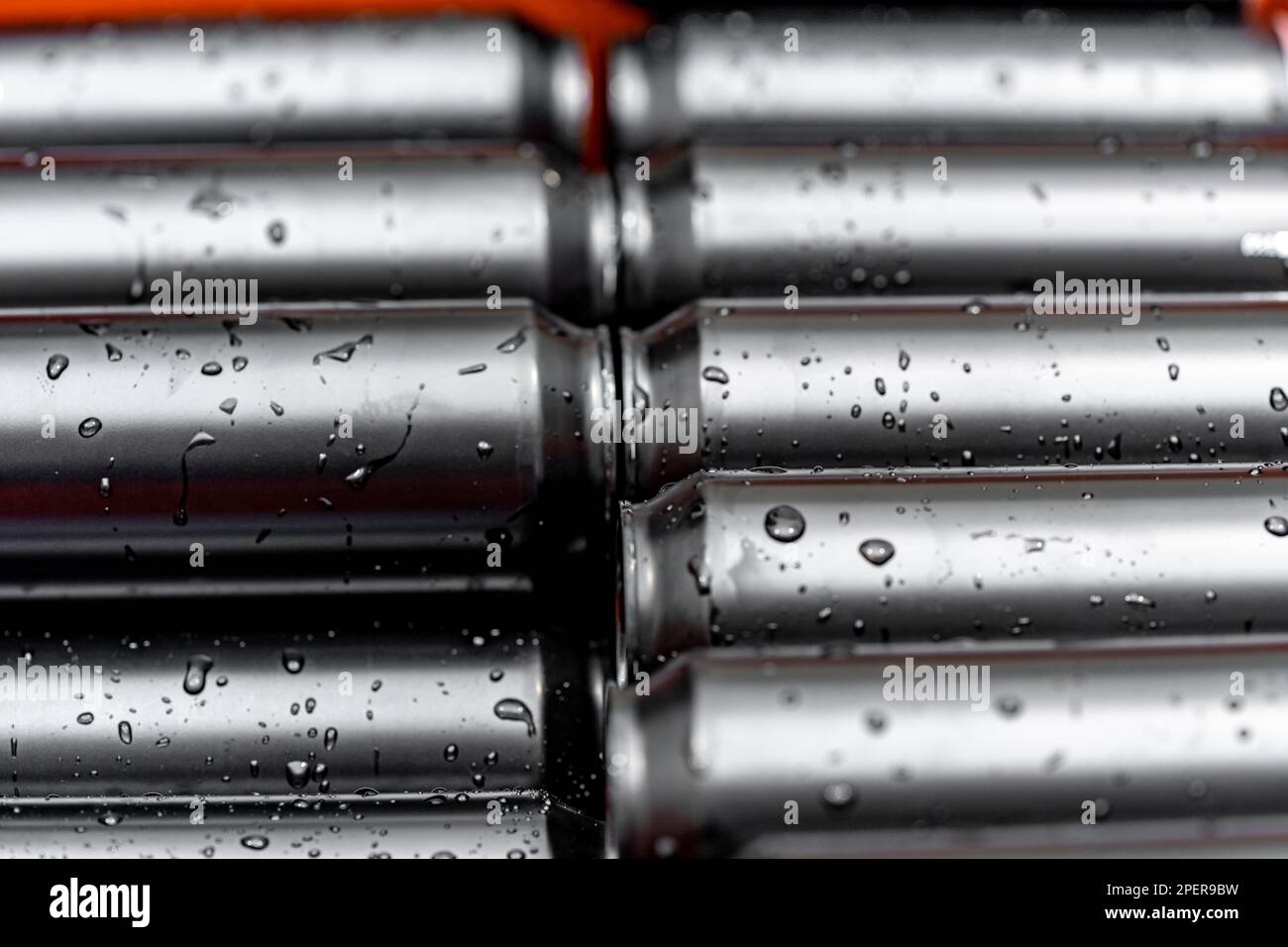 dewy cans with drink in a crate Stock Photo - Alamy